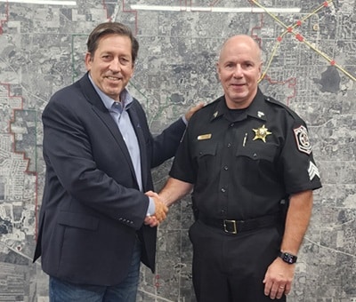 Pres Cecola congratulates Kann 400 - Village of Barrington Hills